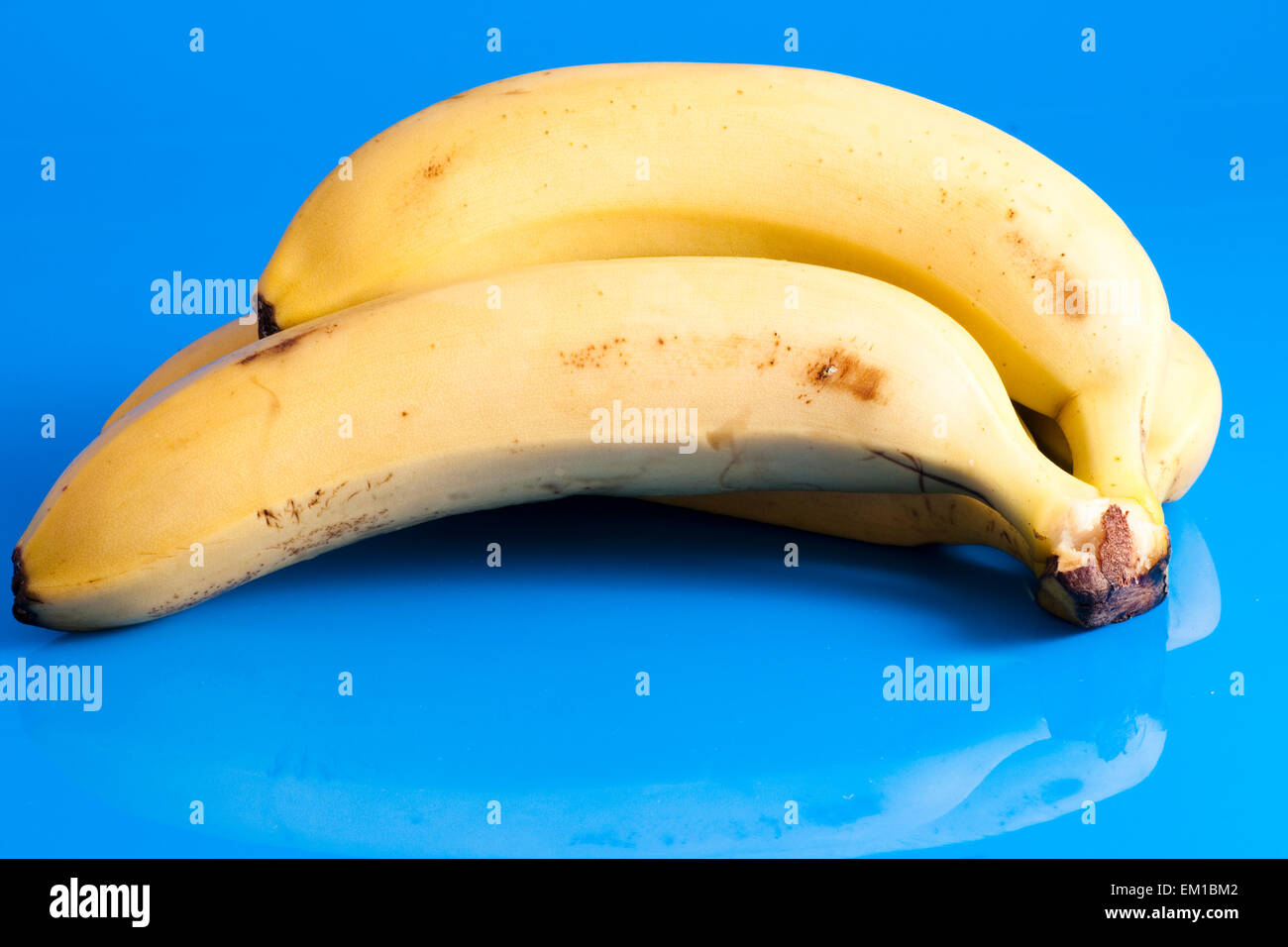 small bunch of ripe bananas Stock Photo - Alamy