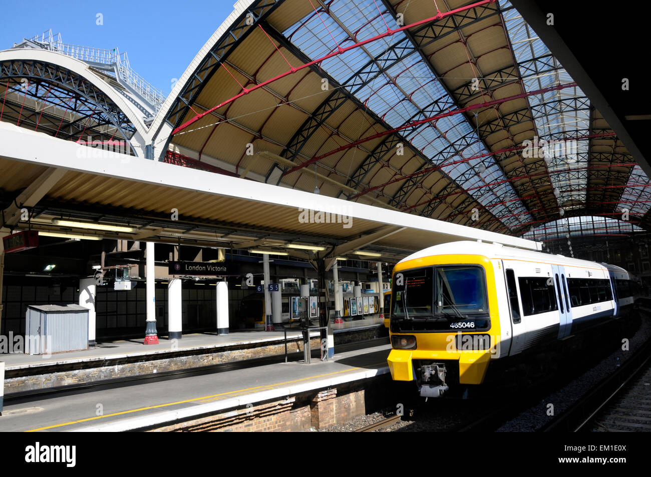 London, England, UK. Victoria Station. Train leaving a platform. Class ...