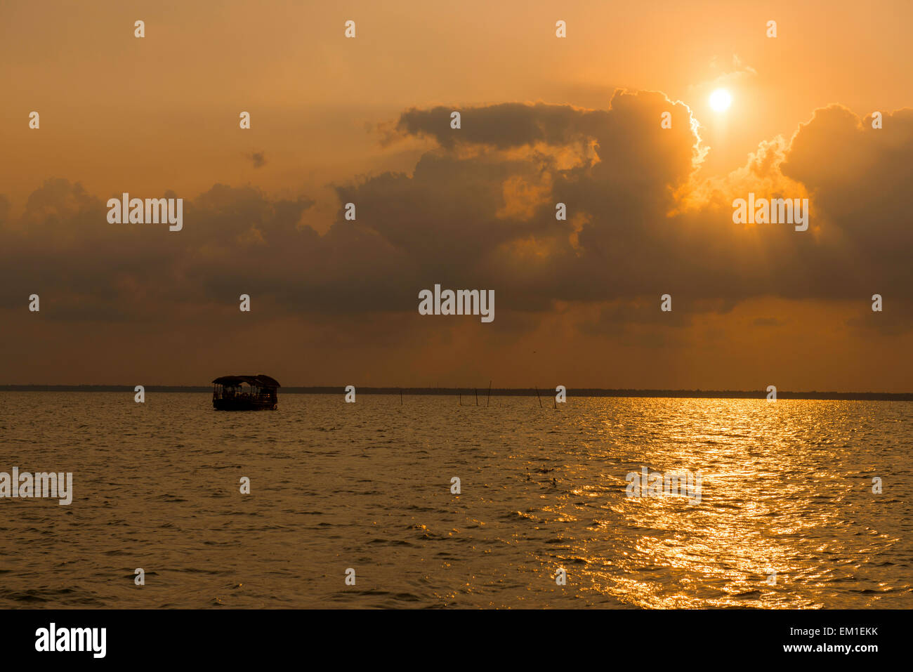 Sunset on the Vembanad Lake in Kumarakom, Kerala India Stock Photo - Alamy
