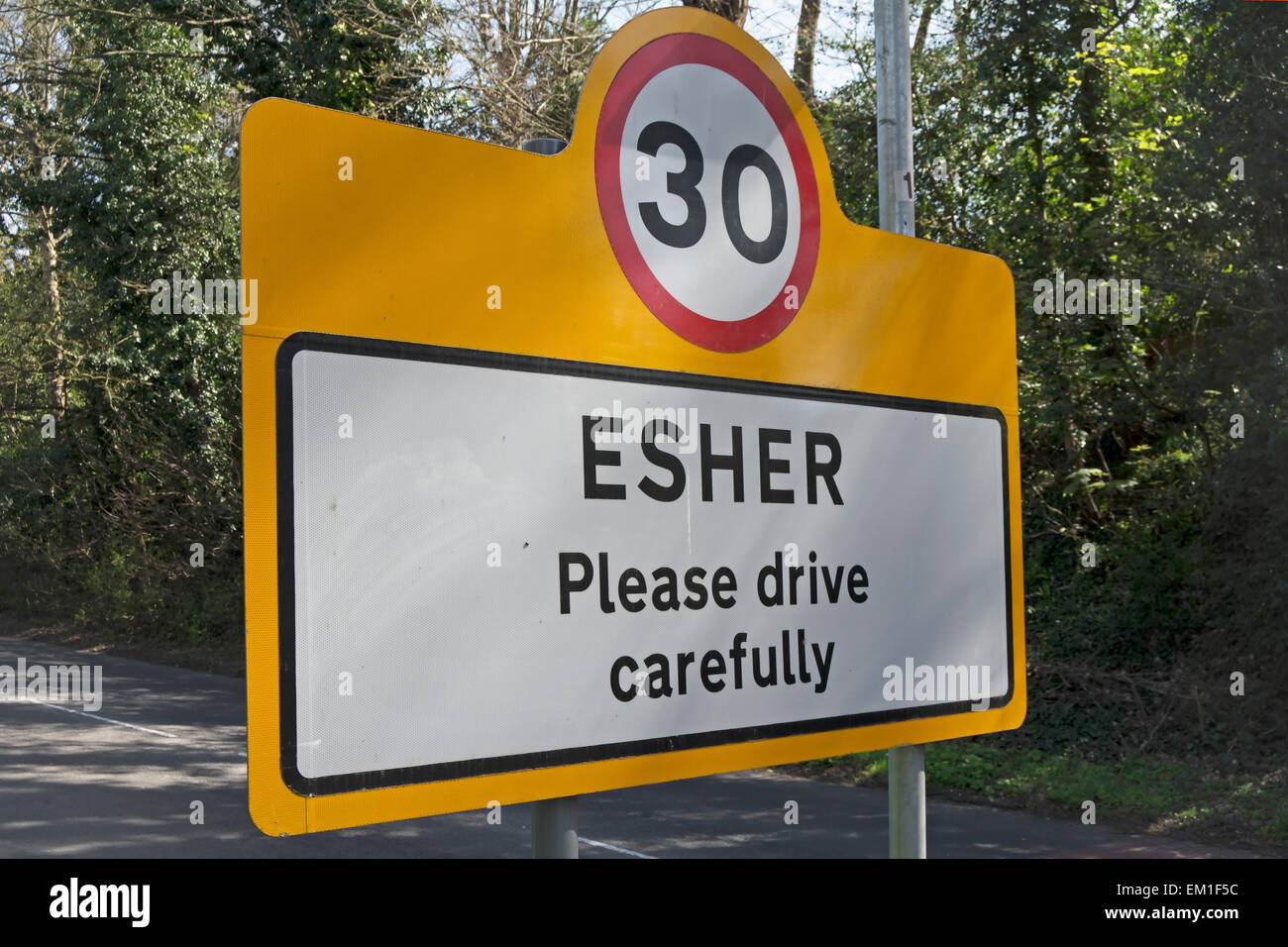 esher please drive carefully road sign with 30mph speed limit notice ...
