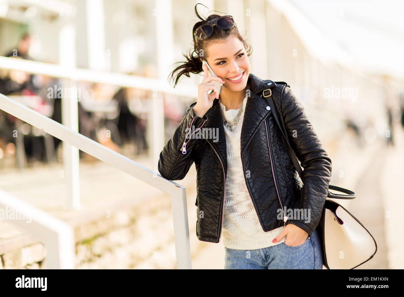 Young woman with mobile phone Stock Photo - Alamy