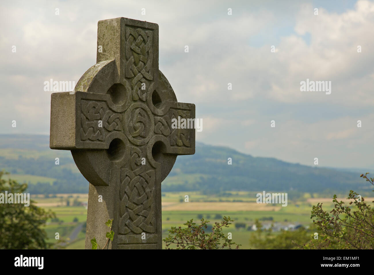 A Cross Tombstone With The Landscape In The Background; Stirling ...