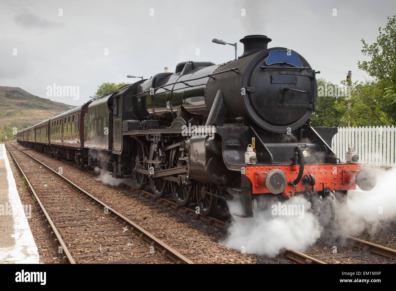 Steam Coming From A Train Moving Down The Tracks; Mallaig Highlands ...