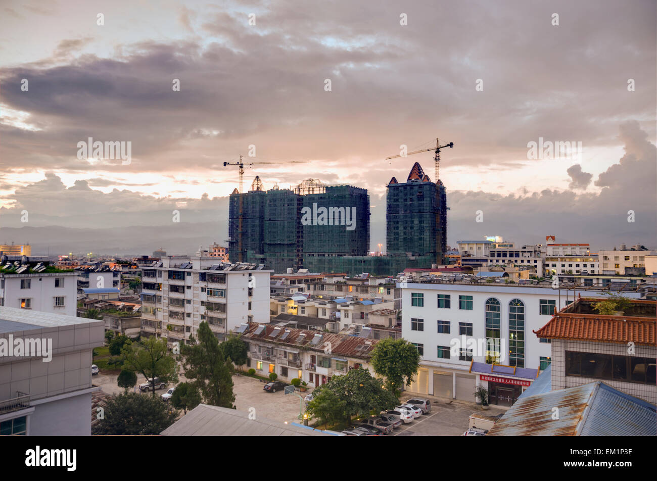 Cranes Working On Highrise Buildings With Clouds Overhead; Mingshi ...
