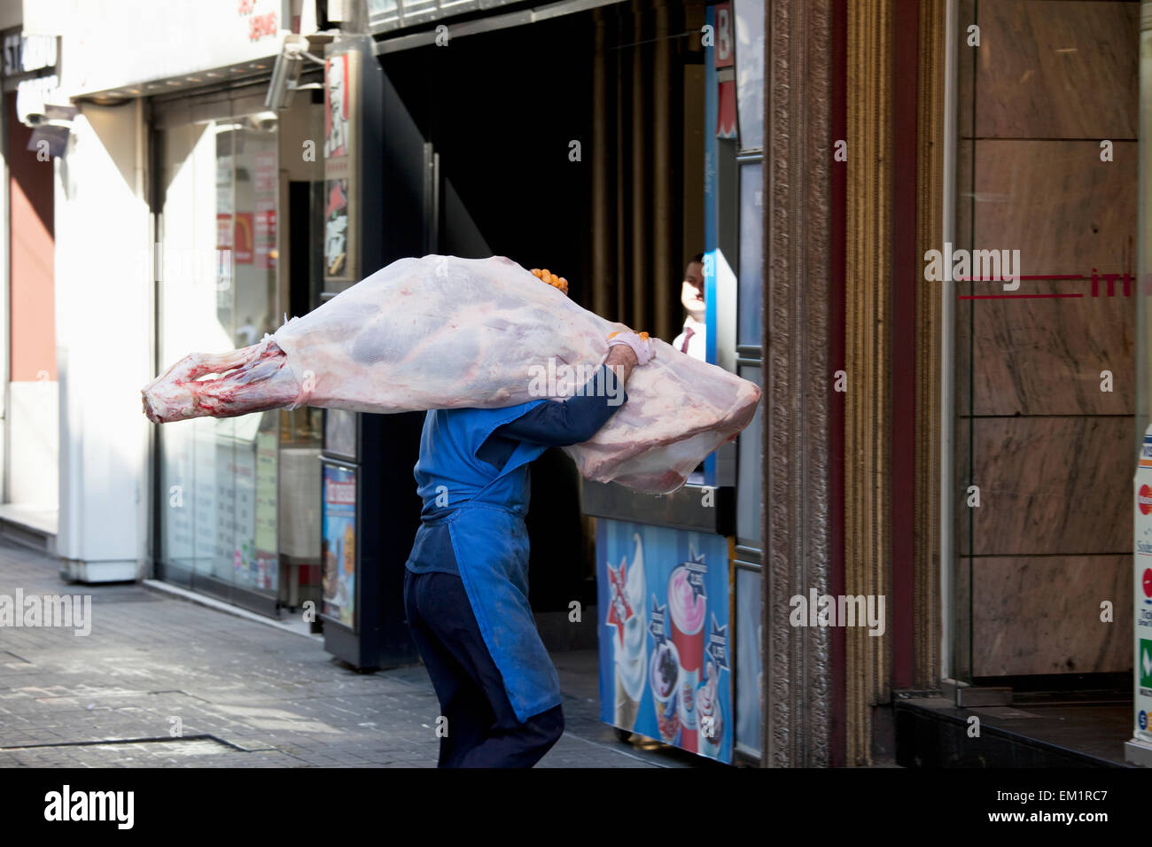 Butcher Taking In Raw Meat To Restaurant Near Taksim Square; Istanbul ...