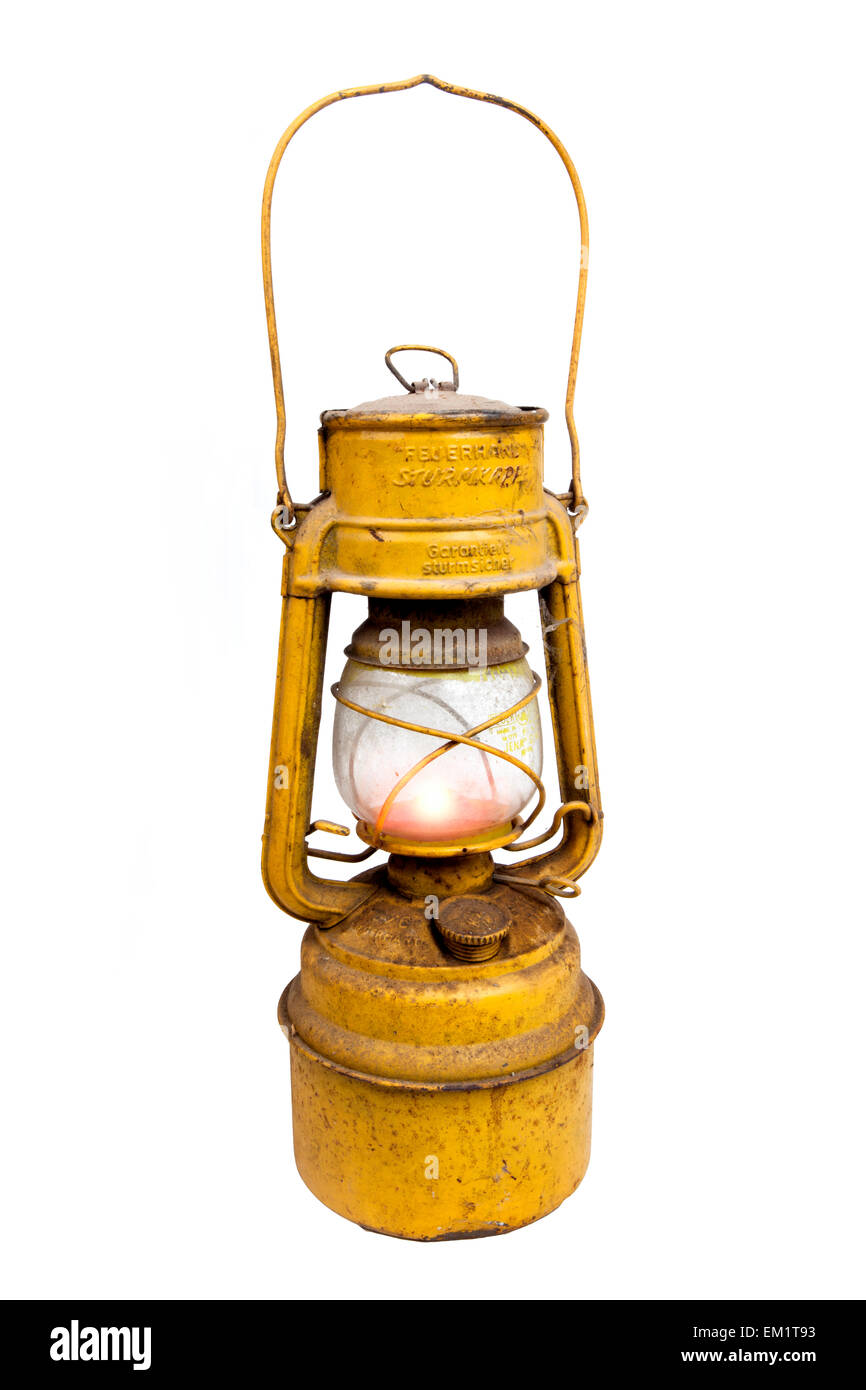 Old rusty oil lamp, isolated on white background Stock Photo - Alamy