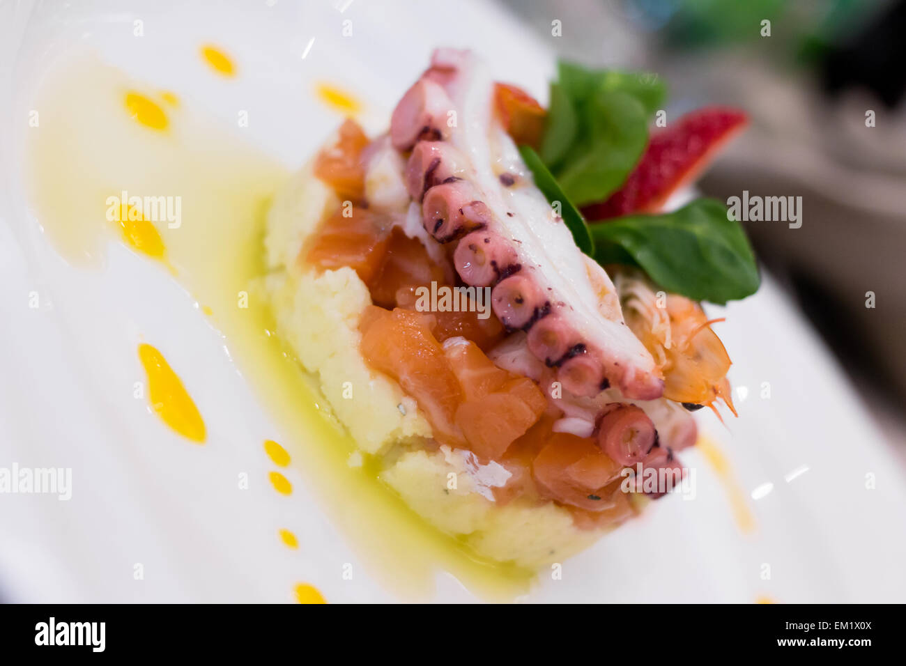 Octopus tentacle with crispy shrimp Stock Photo - Alamy