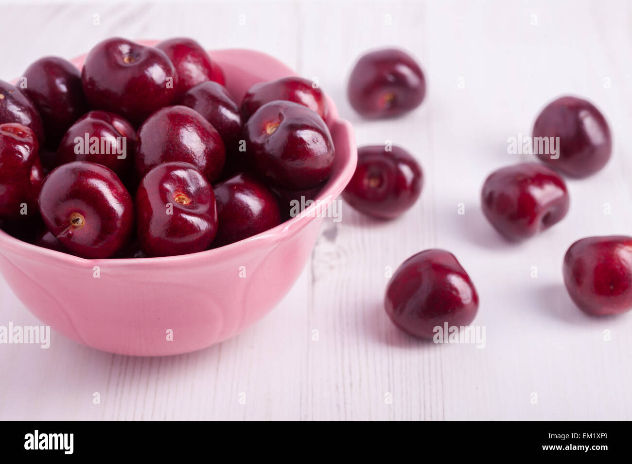 Sweet cherries in pink hi-res stock photography and images - Alamy