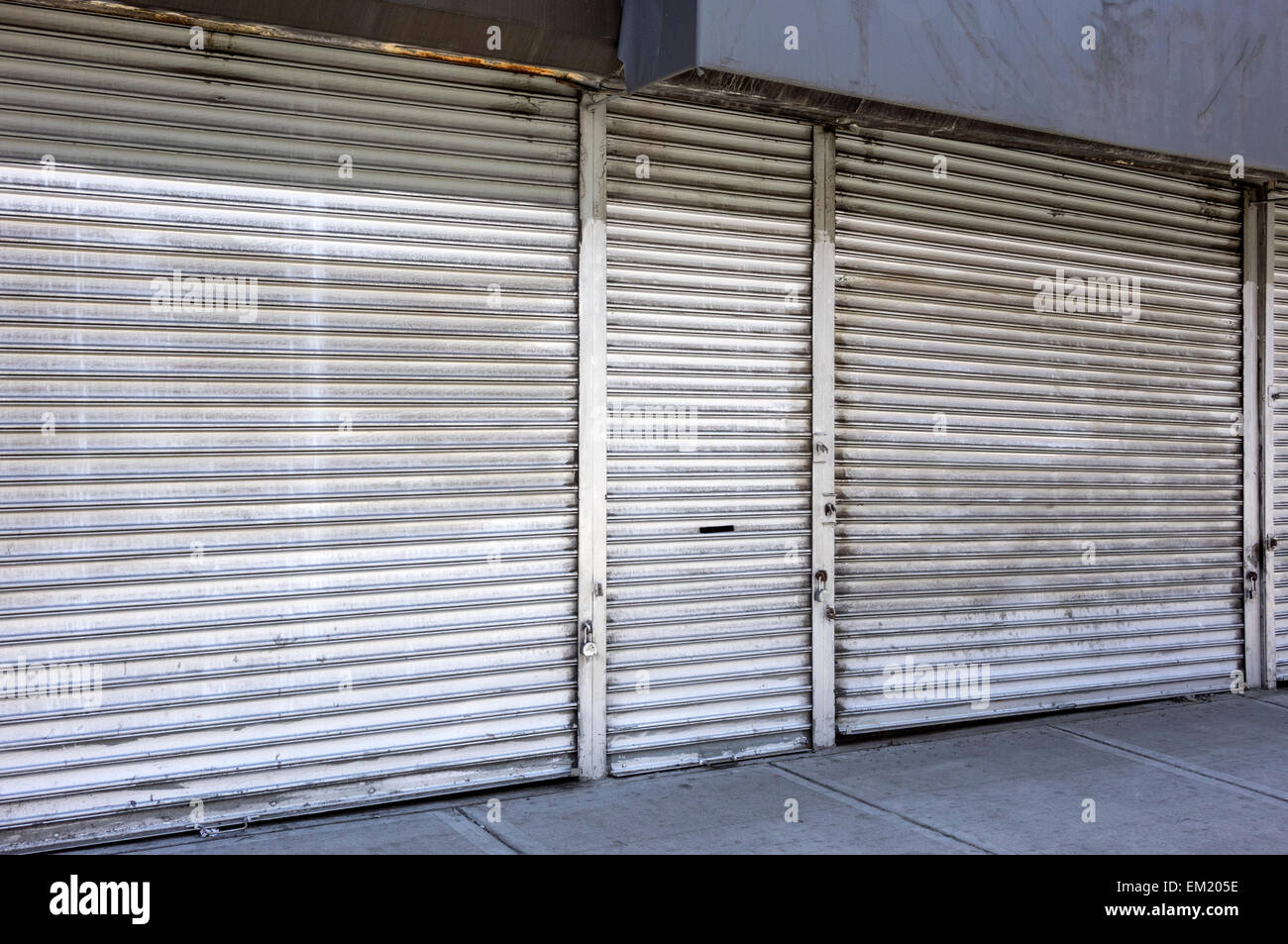 Shut down, a concept. The shutters of a small business have been pulled ...