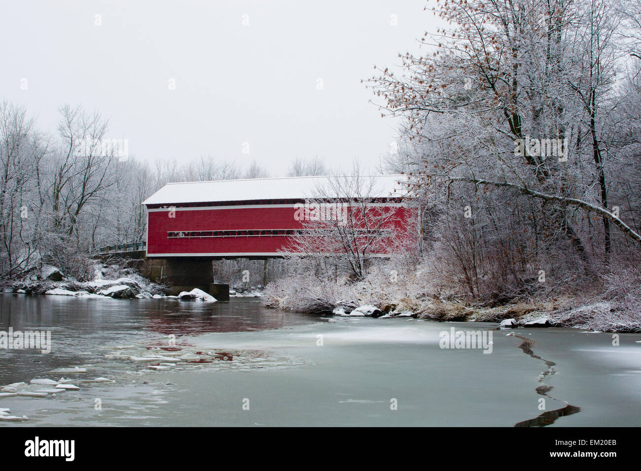 Red Covered Bridge In The Winter; Adamsville Quebec Canada Stock Photo ...