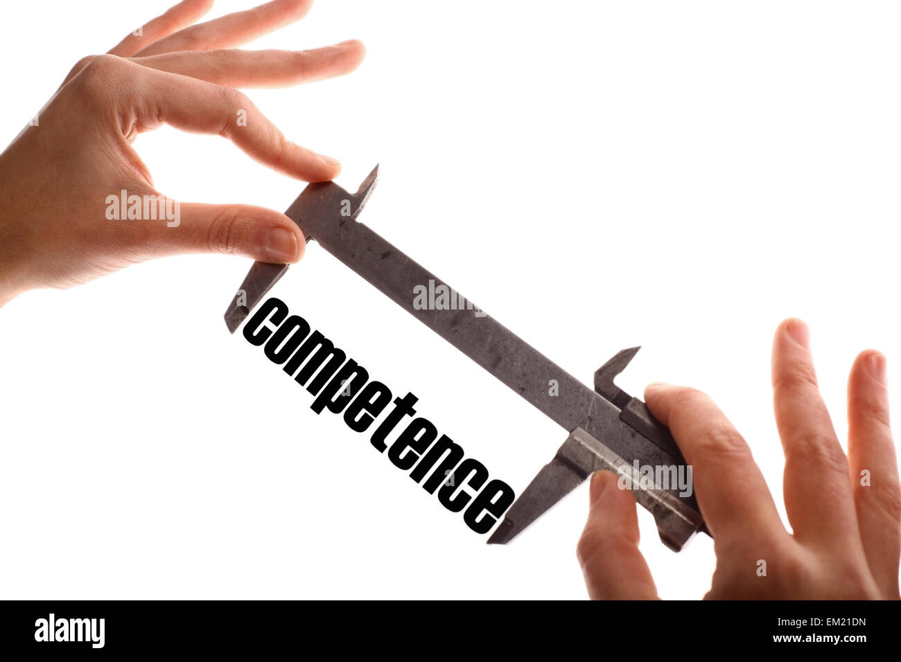 Color horizontal shot of two hands holding a caliper and measuring the ...