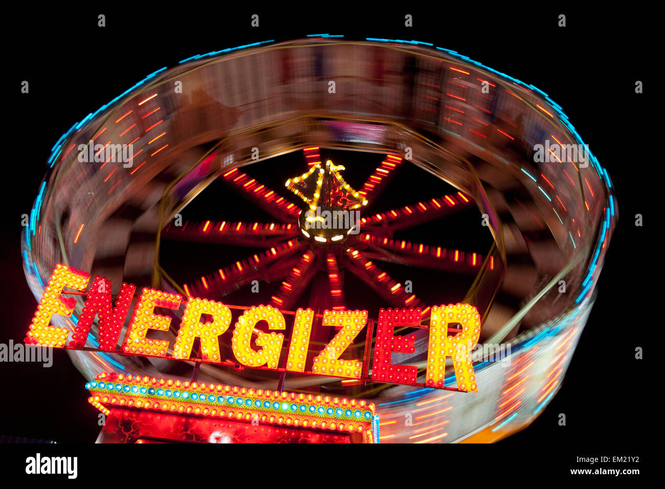 An Amusement Park Ride Called Energizer Illuminated At Night; South ...