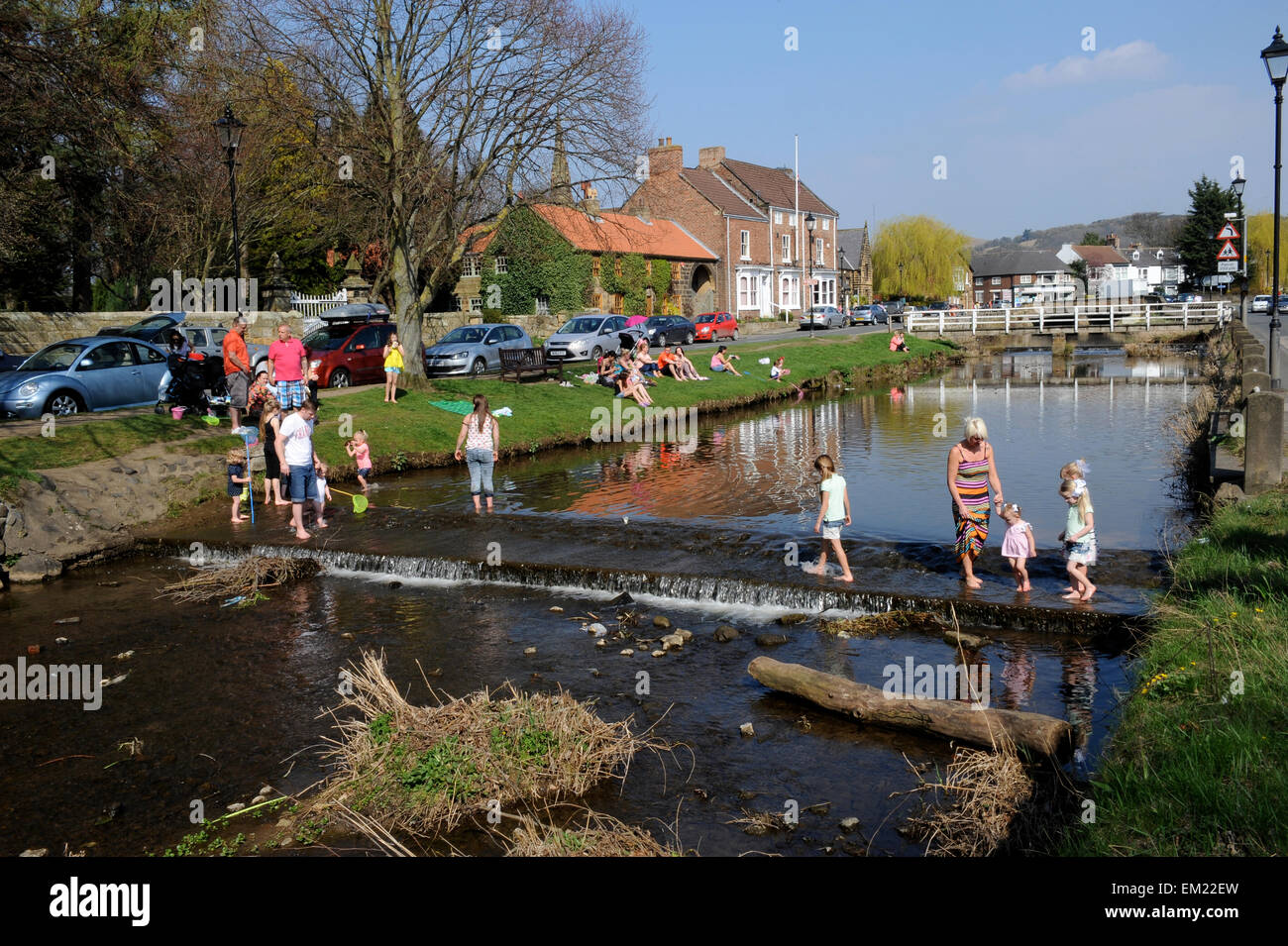 Families paddling and fishing in The River Leven in Great Ayton, North ...