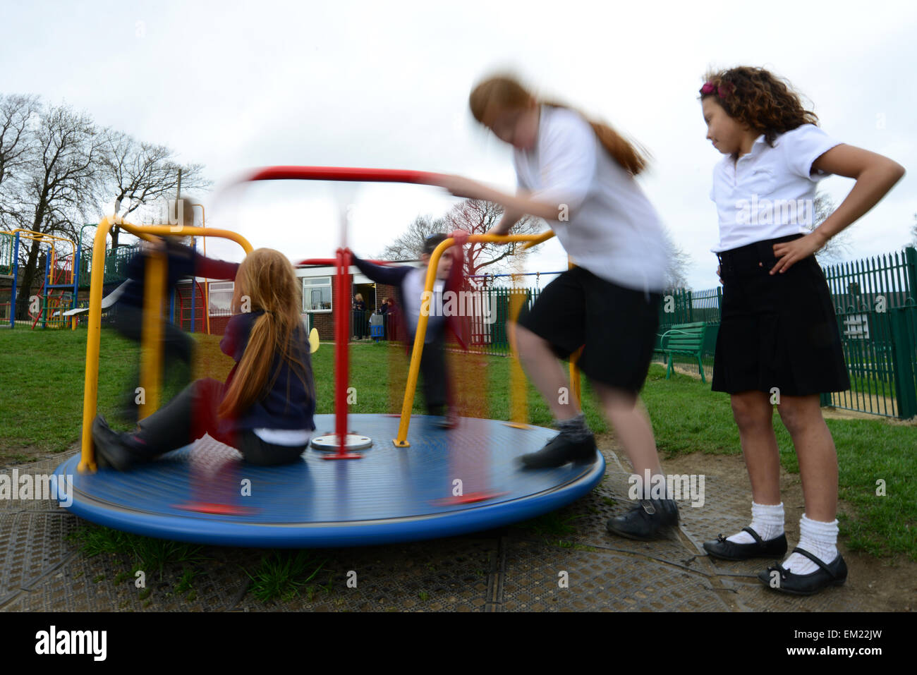 School girls playing in playground hi-res stock photography and images ...