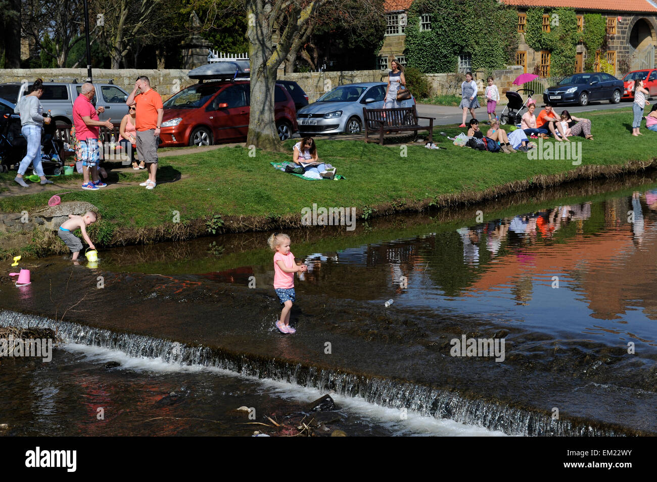 Families paddling and fishing in The River Leven in Great Ayton, North ...