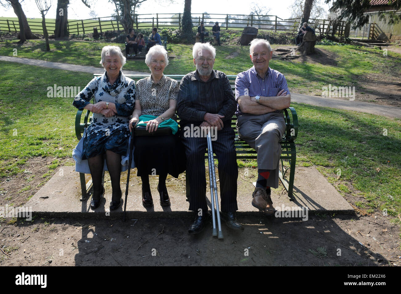 Four old man sitting on a bench hi-res stock photography and images - Alamy