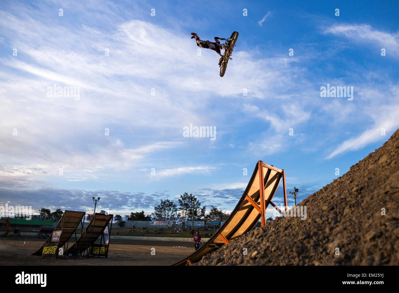 Freestyle motocross riding with blue sky Stock Photo - Alamy