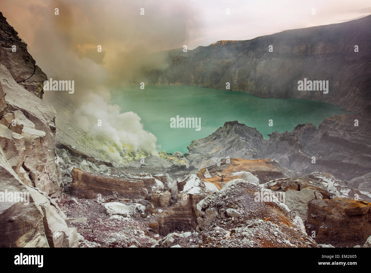 Looking down at the crater lake and sulfur vents / mine in Kawah Ijen ...