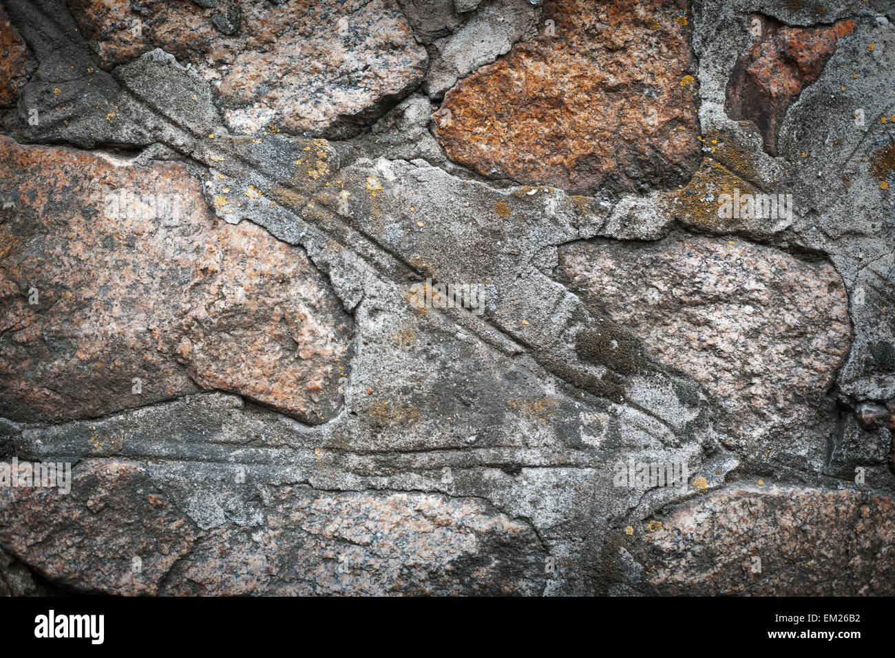 Wall. Natural granite stone texture background. Rough and rusty. Close ...