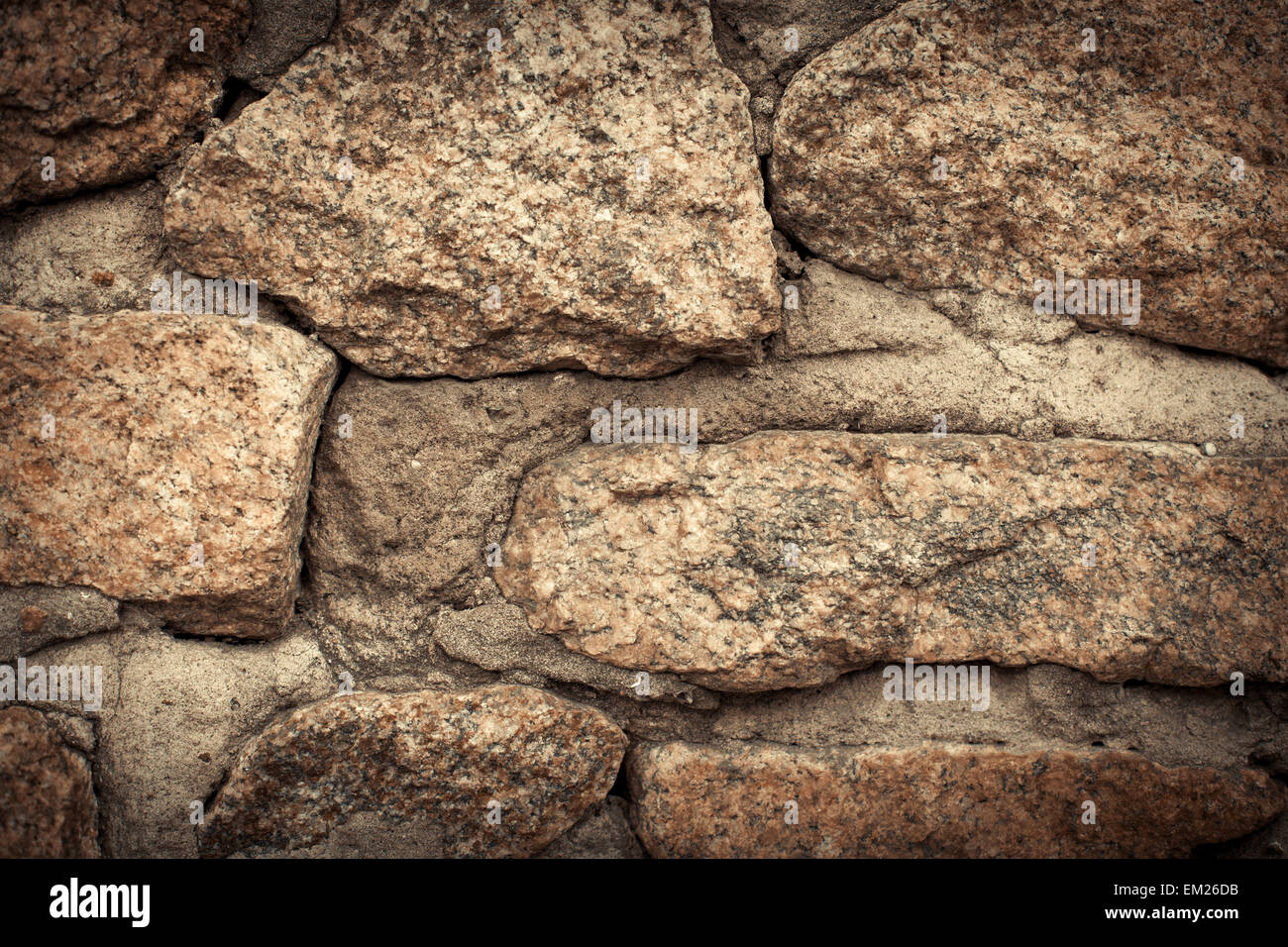 Wall. Natural granite stone texture background. Rough and rusty. Close ...