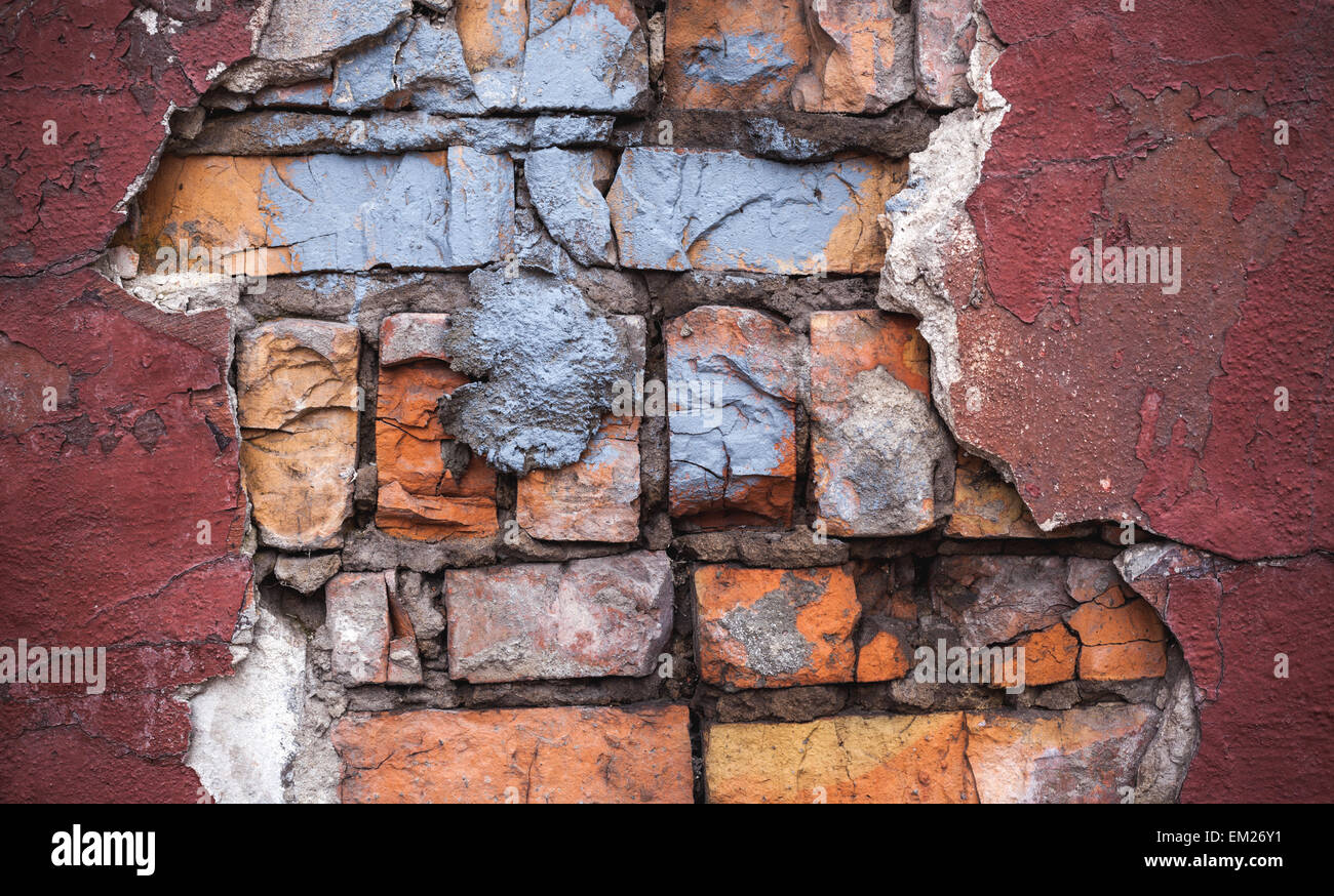 Background of colorful brick wall texture. brickwork. Peeling paint ...