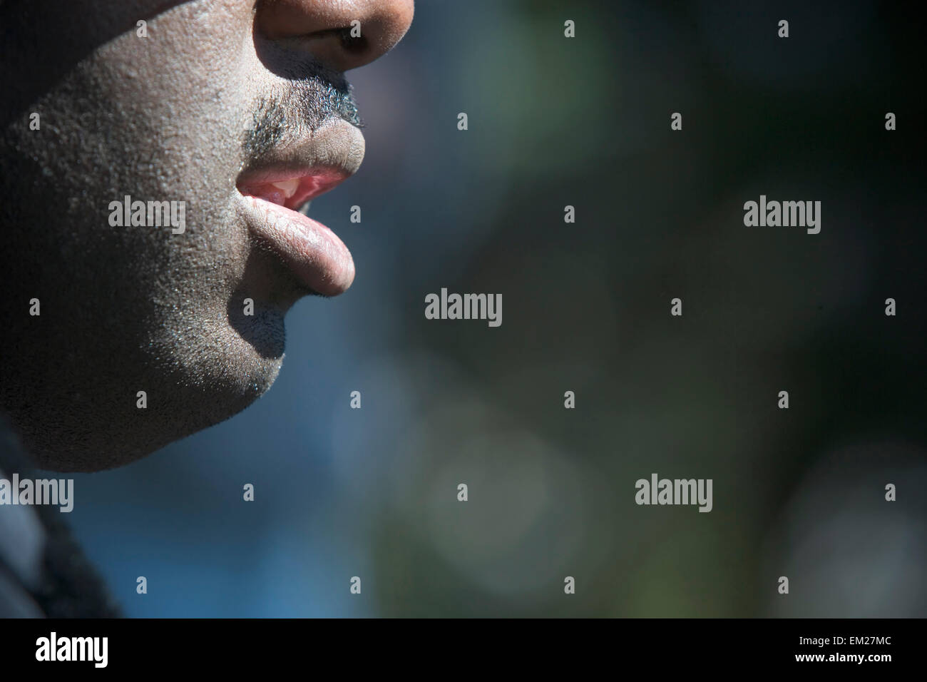 Side view close up of a African American man's lips Stock Photo - Alamy
