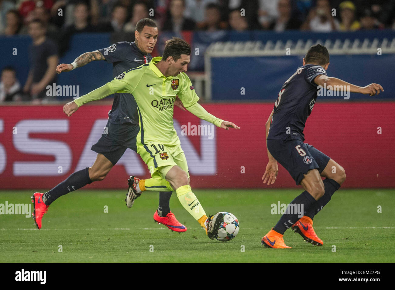 Paris, France. 15th Apr, 2015. Barcelona's Lionel Messi (C) brakes ...