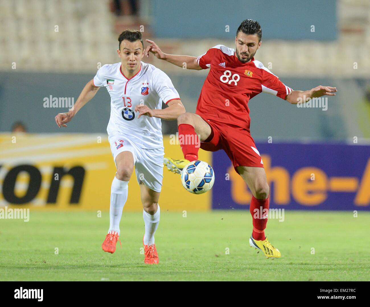 Kuwait City, Kuwait. 15th Apr, 2015. Chadi Hammami (L) of Kuwait's Al ...