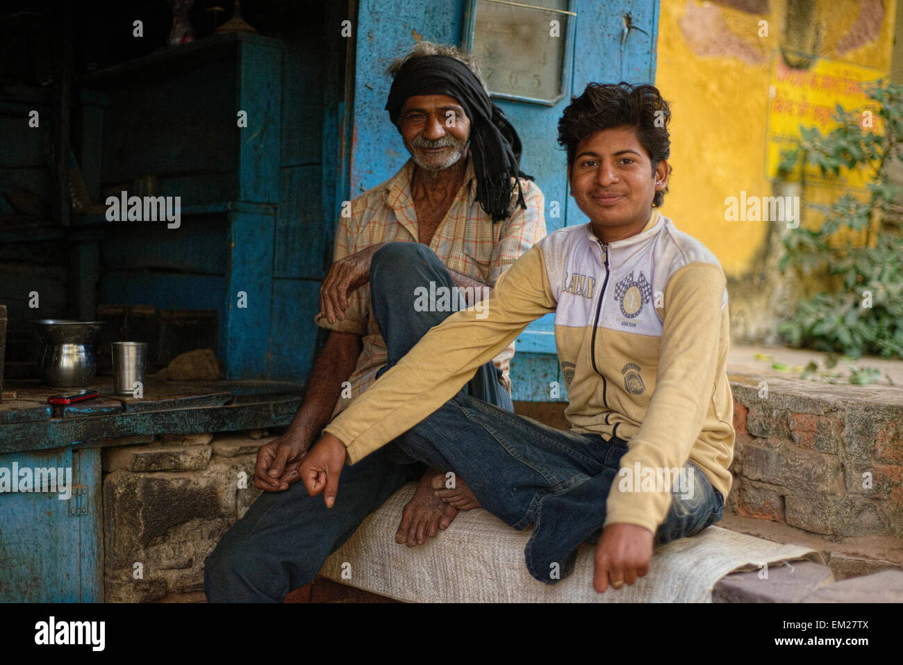 Boy and small shop keeper Stock Photo - Alamy