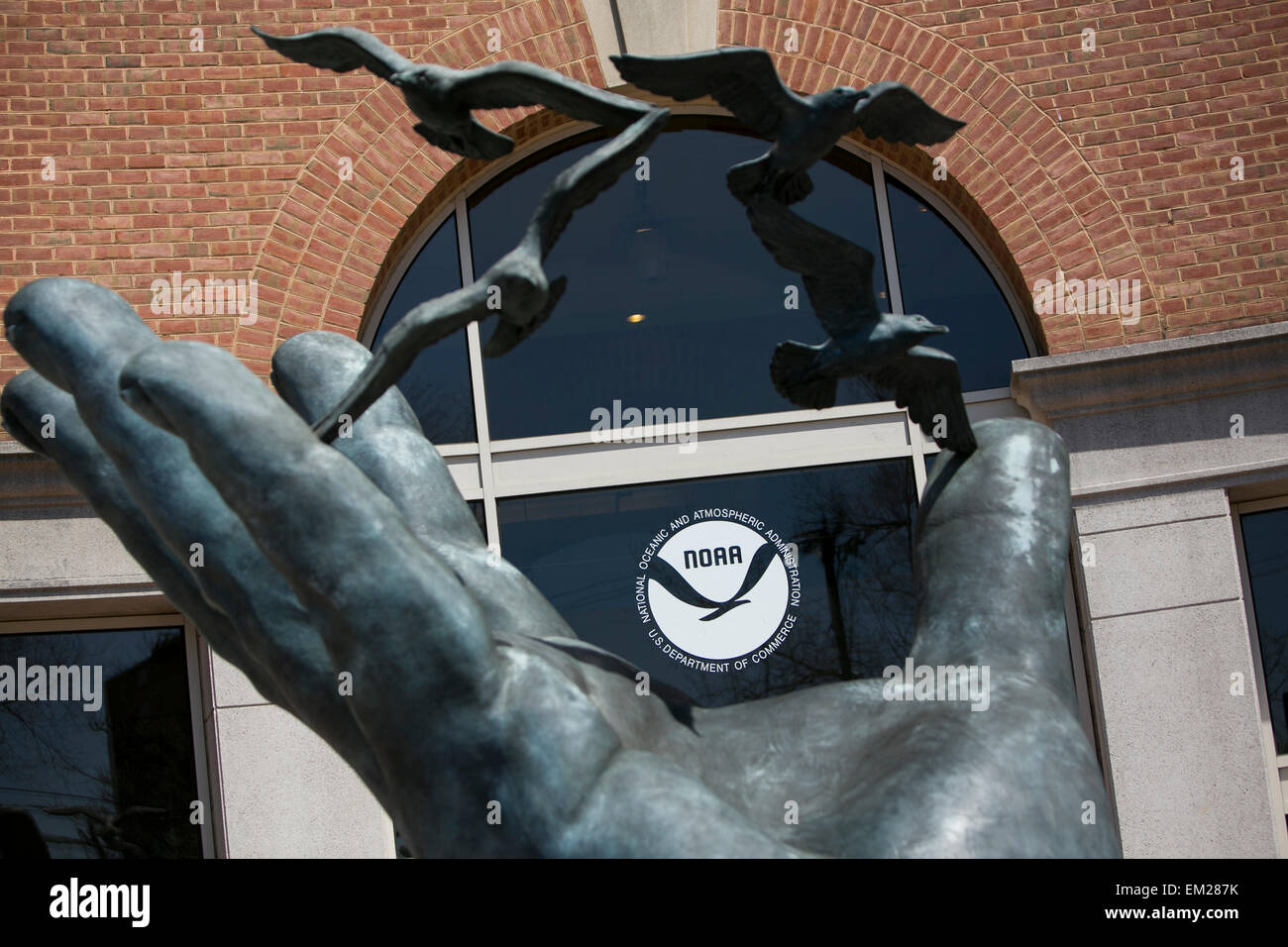 An exterior view of the headquarters of the National Oceanic and ...