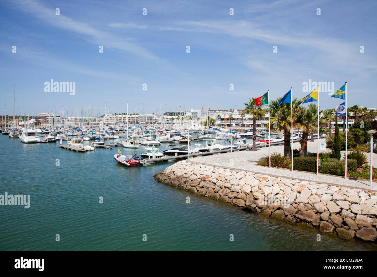 Flags Lining The Stone Wall In The Harbour; Lagos Algarve Portugal ...