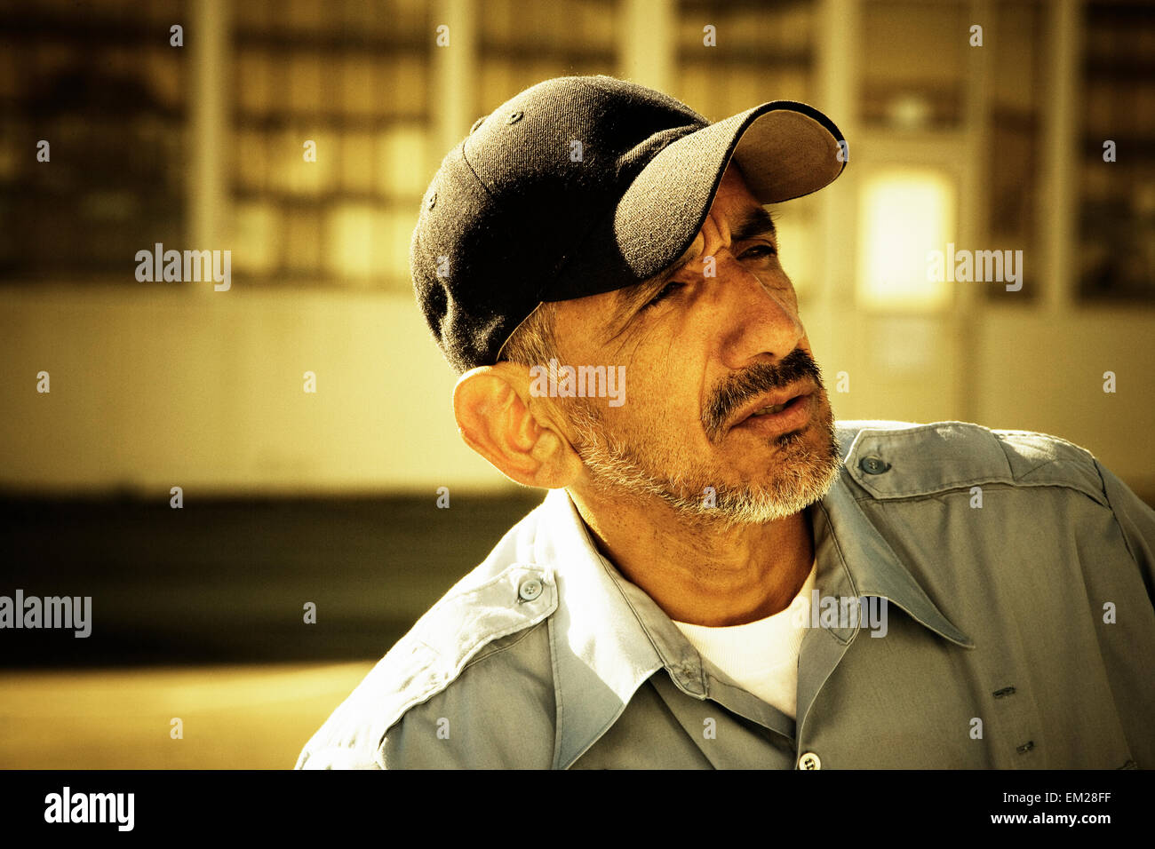 A man wearing a baseball cap Stock Photo - Alamy