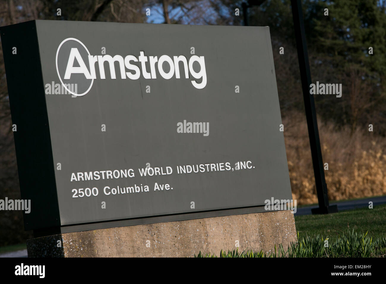 A logo sign outside the headquarters of Armstrong World Industries, Inc ...