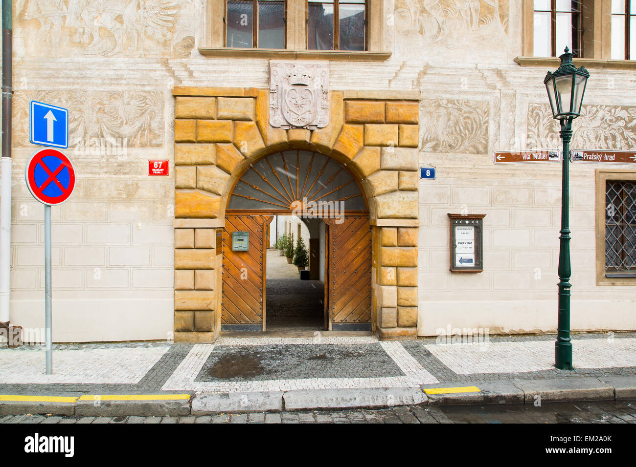 The gate at the Prague street. In front of the gates of the sign and ...
