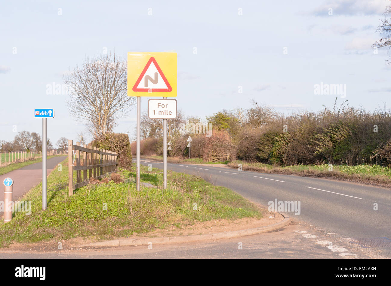 Double bend warning road sign hi-res stock photography and images - Alamy
