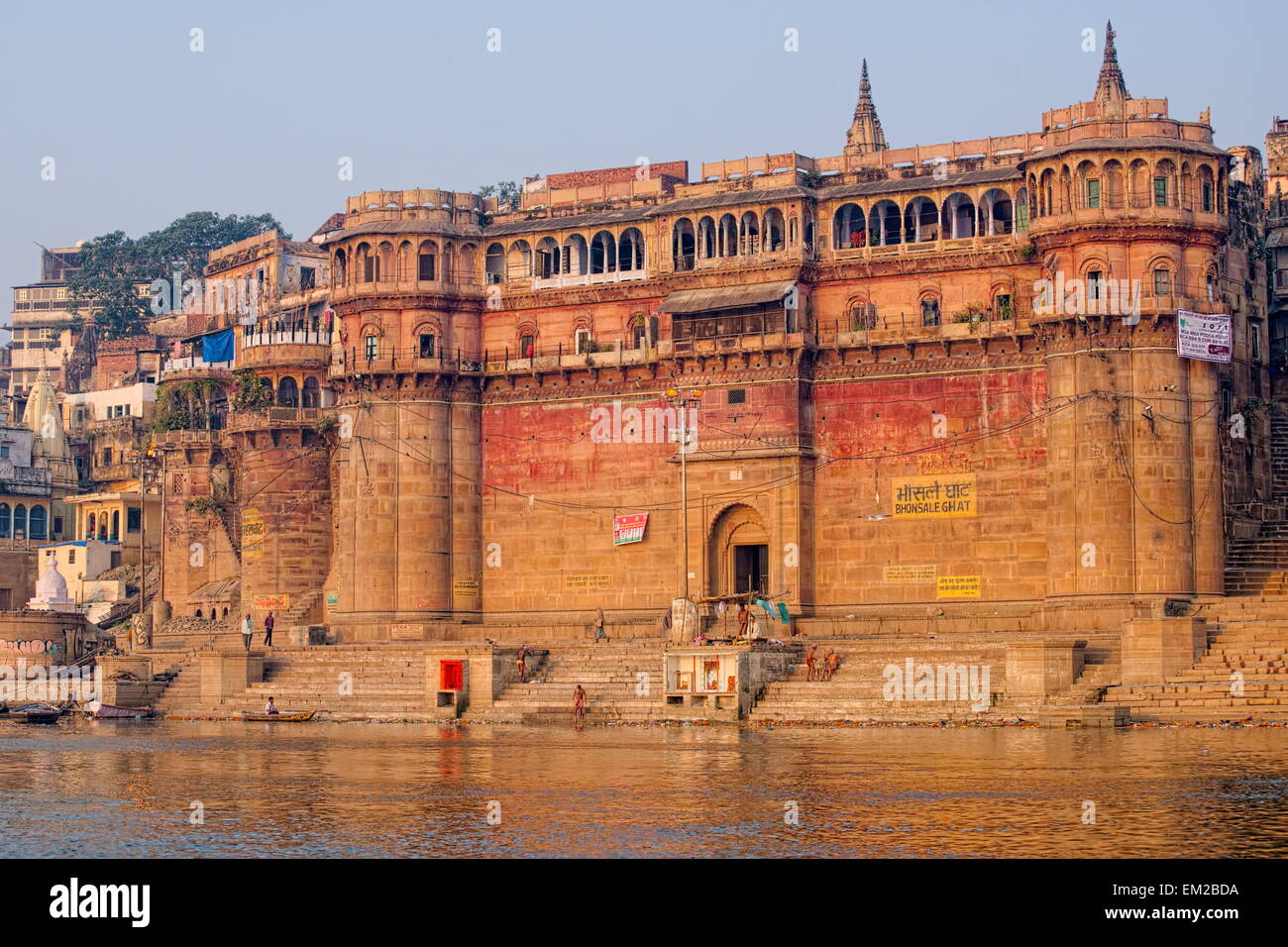 The activity of the ghats of Varanasi, between the city and the Ganges ...