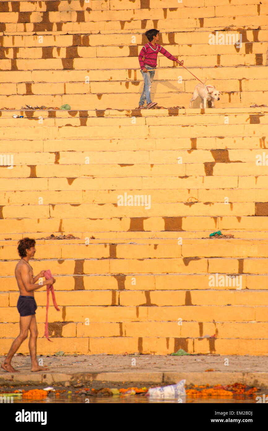 The activity of the ghats of Varanasi, between the city and the Ganges ...