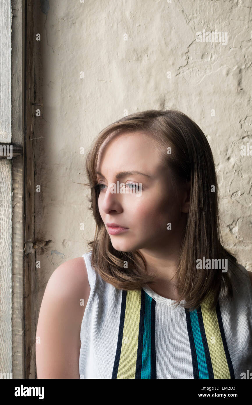 Pensive young woman thinking hi-res stock photography and images - Alamy