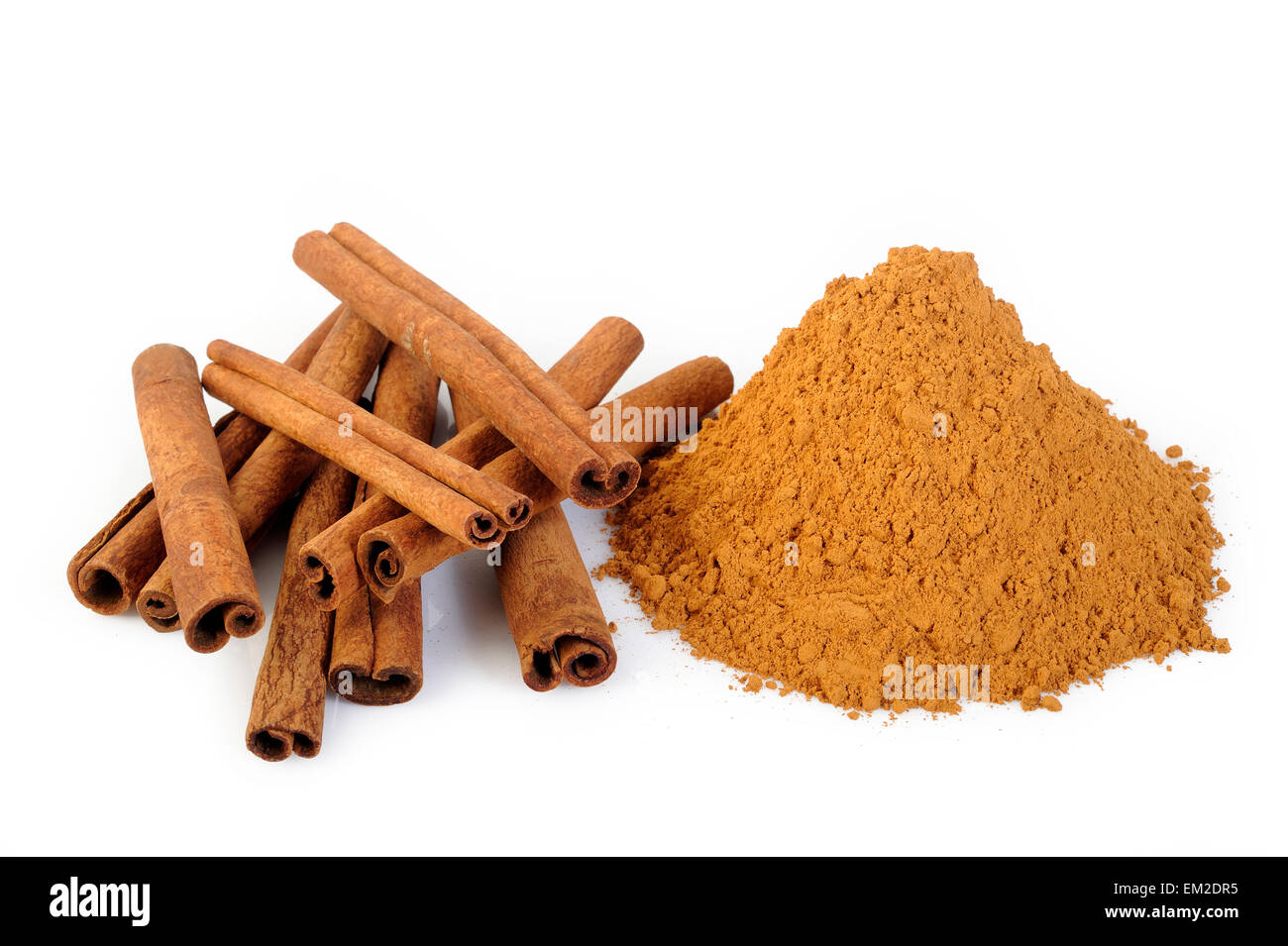 Cinnamon sticks and powder on white background Stock Photo - Alamy