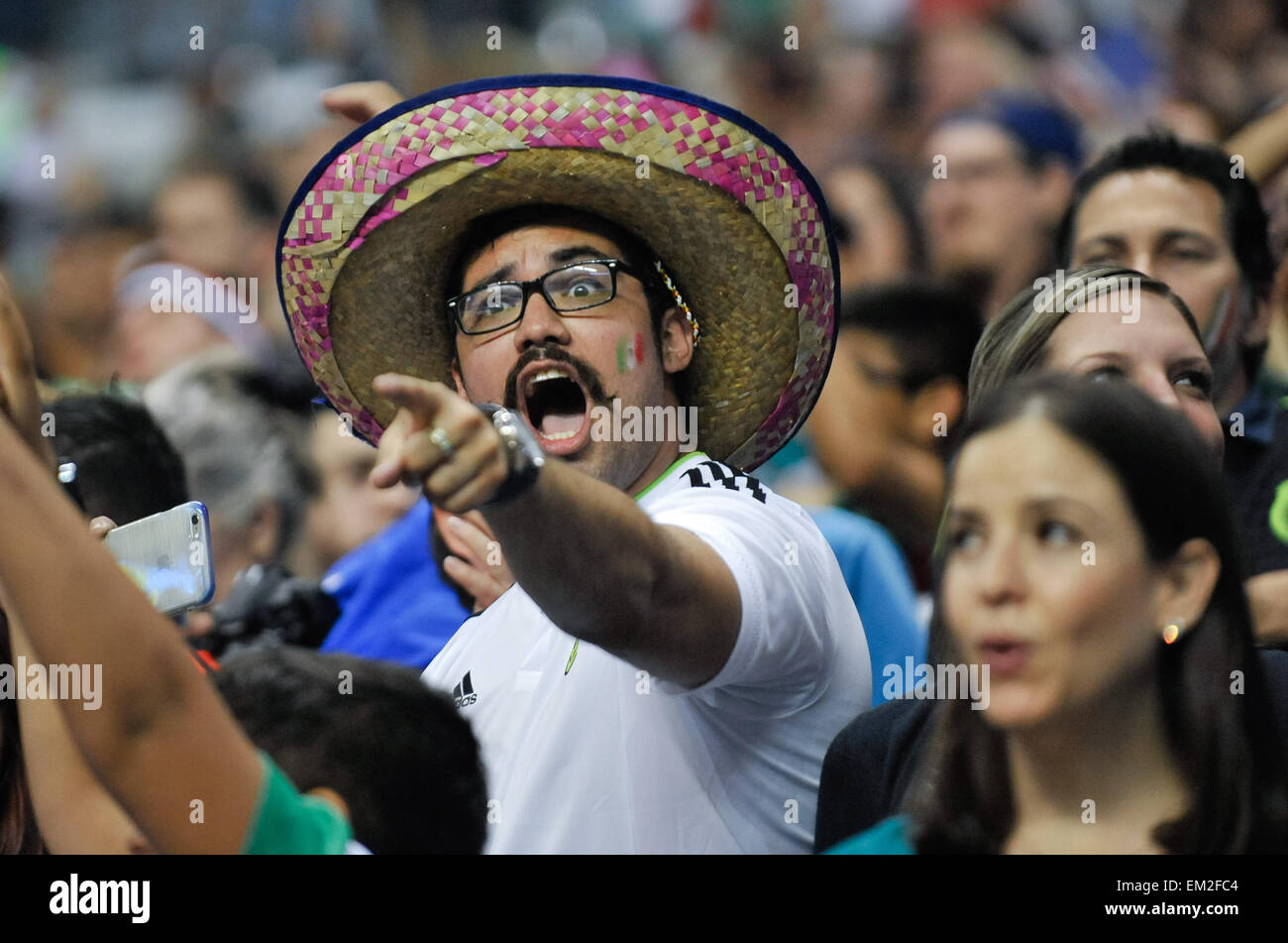 San Antonio, TX, USA. 15th Apr, 2015. A Mexico team fan gestures from ...