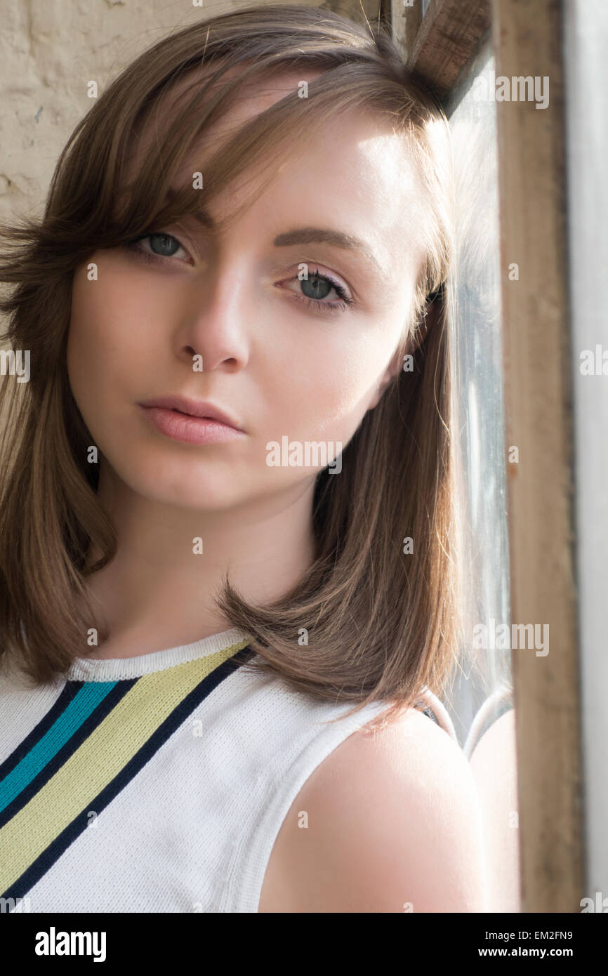 Beautiful young woman leaning hi-res stock photography and images - Alamy