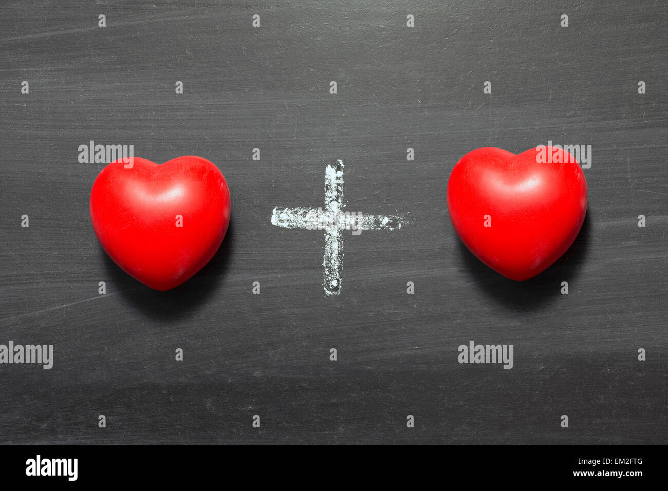 heart plus heart chalk drawing on blackboard Stock Photo - Alamy