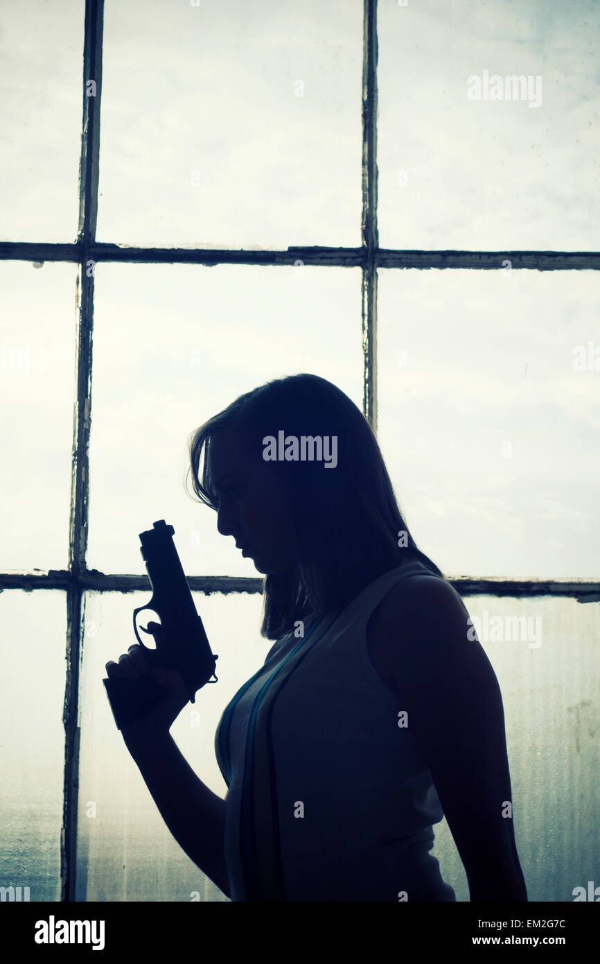 Woman gun silhouette hi-res stock photography and images - Alamy