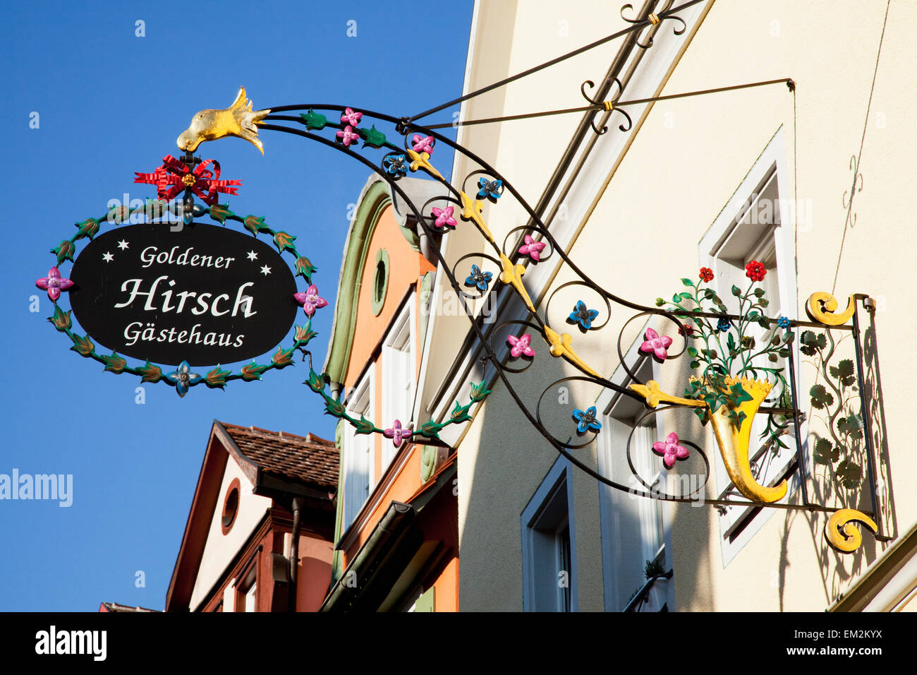 A Decorative Colourful Sign Hanging From A Building; Rothenburg Ob Der ...