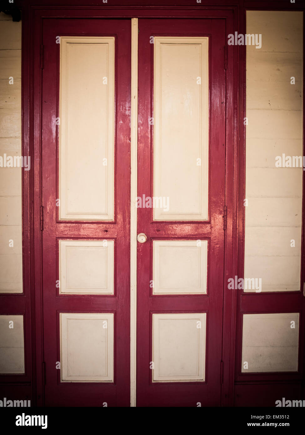 cream and red wooden door Stock Photo - Alamy