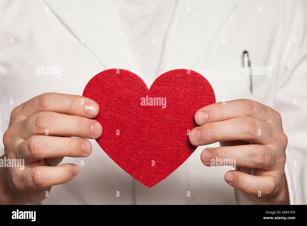 Doctor with heart Stock Photo - Alamy