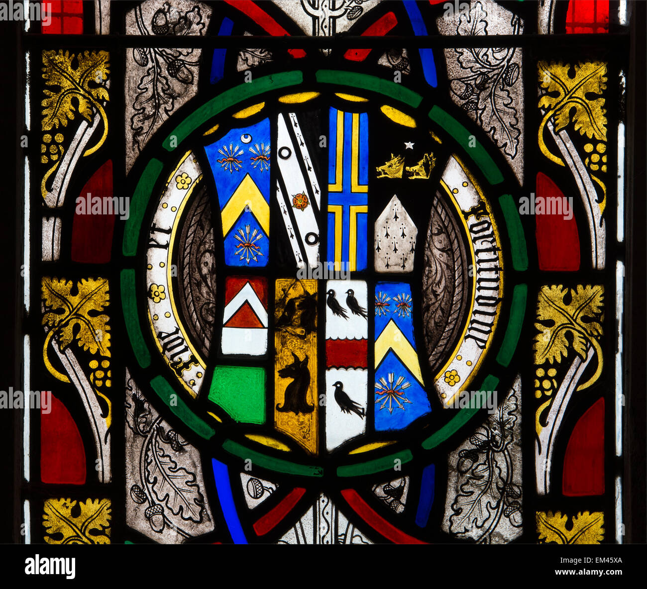 Heraldic stained glass saints church hi-res stock photography and ...