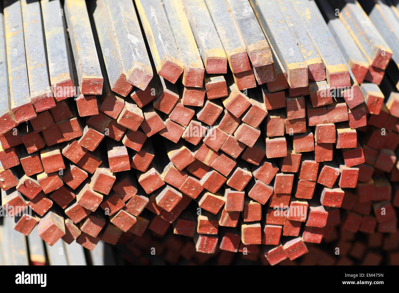 long metal bars of square cross section of small size Stock Photo - Alamy