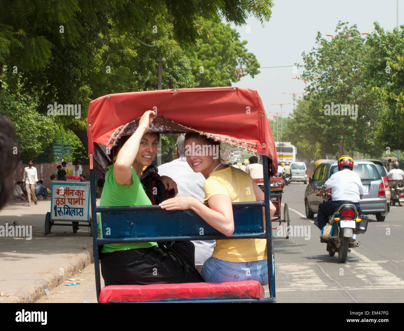 Girls riding rickshaw hi-res stock photography and images - Alamy