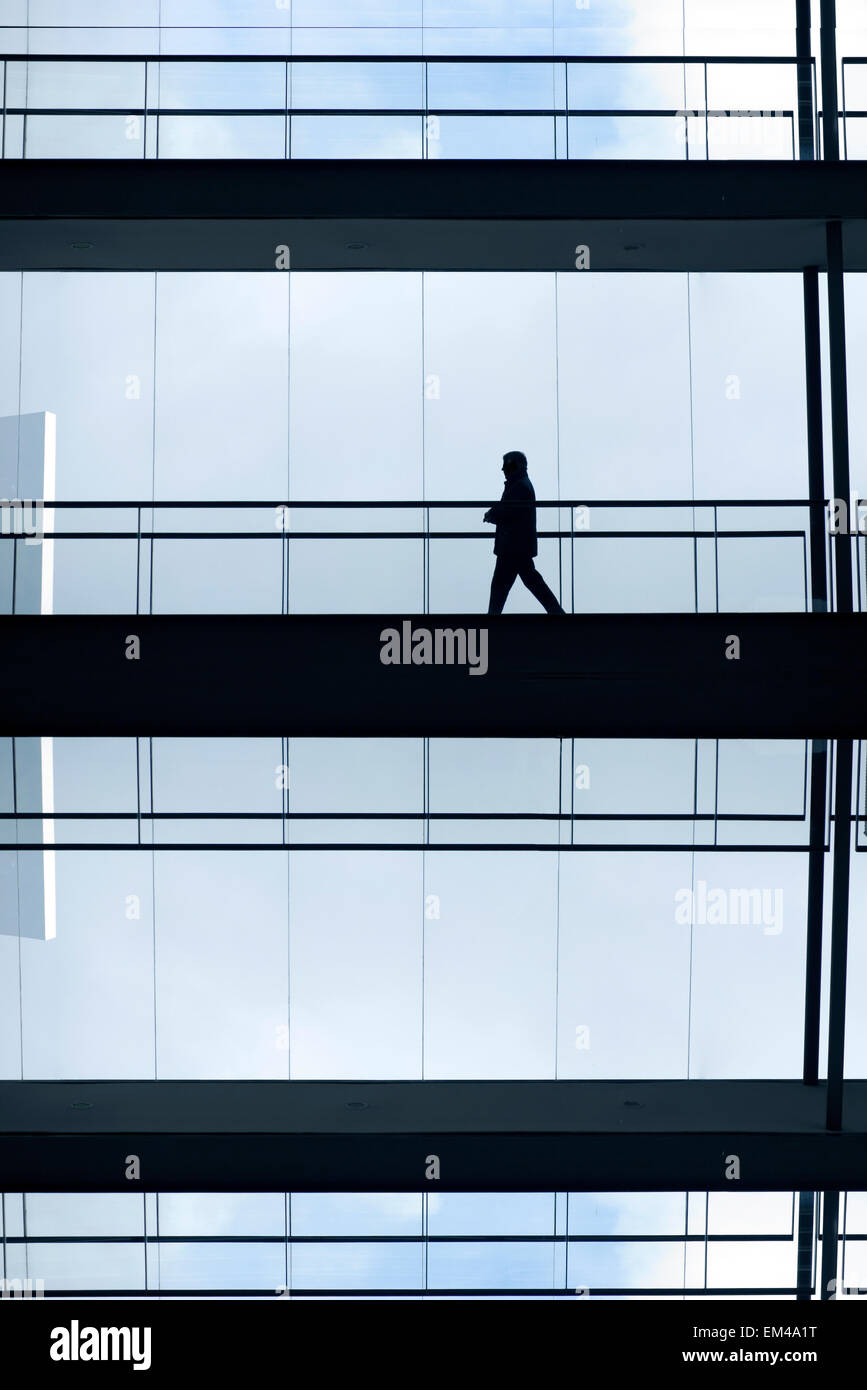 man inside a modern office building Stock Photo - Alamy